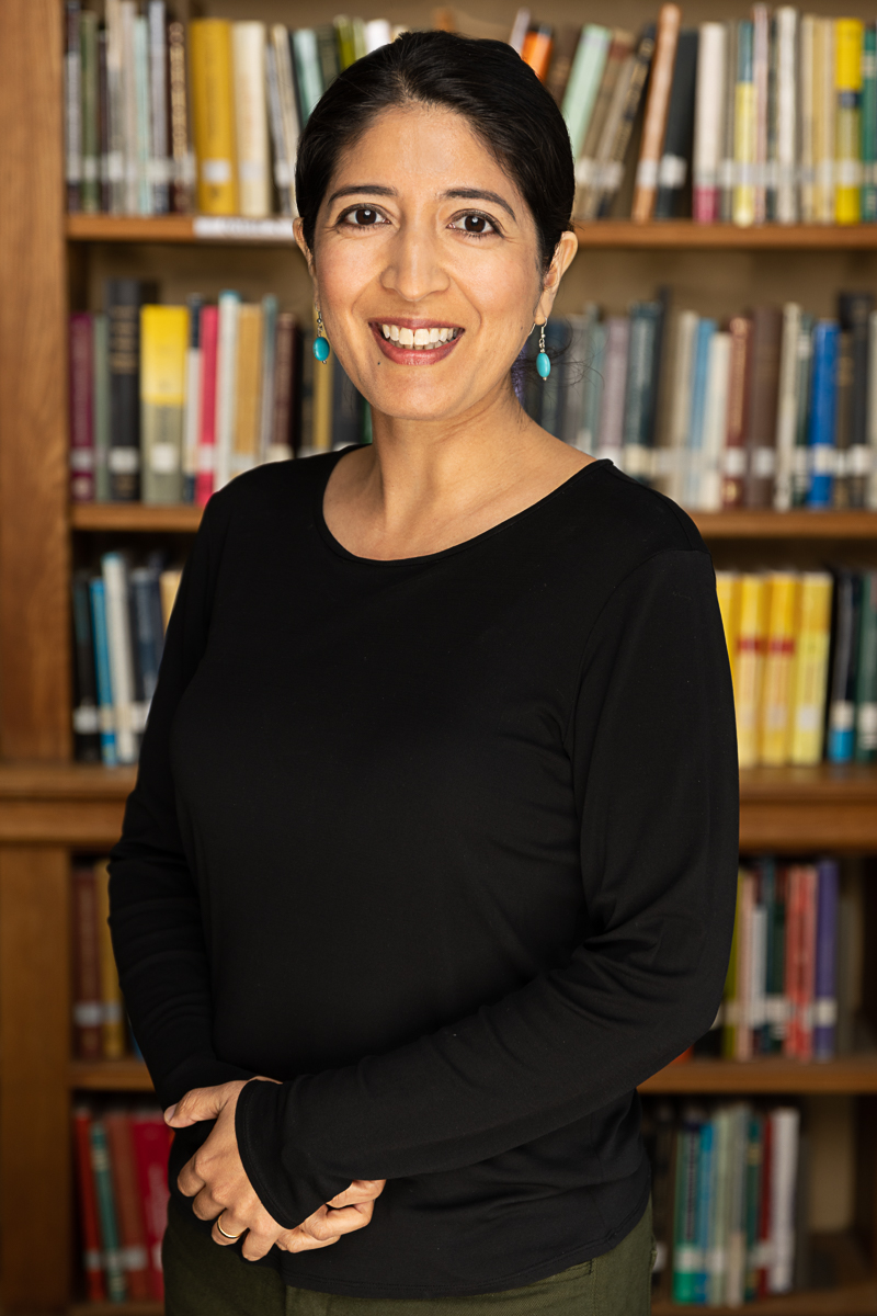 A person in a black shirtDescription automatically generated with ...